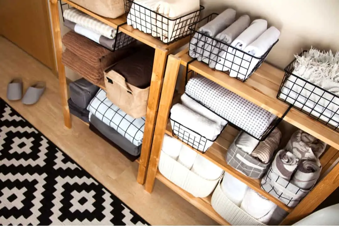 6 Simple Storage Ideas for Extra Bedding - Homely Baron